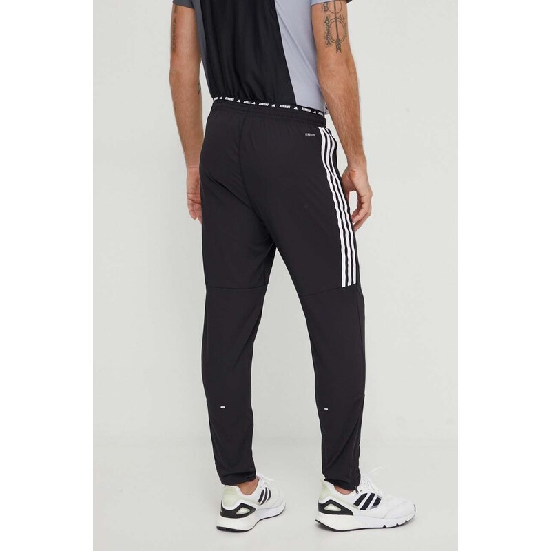 adidas Performance pantaloni da corsa Own the Run colore nero IK4982 ...